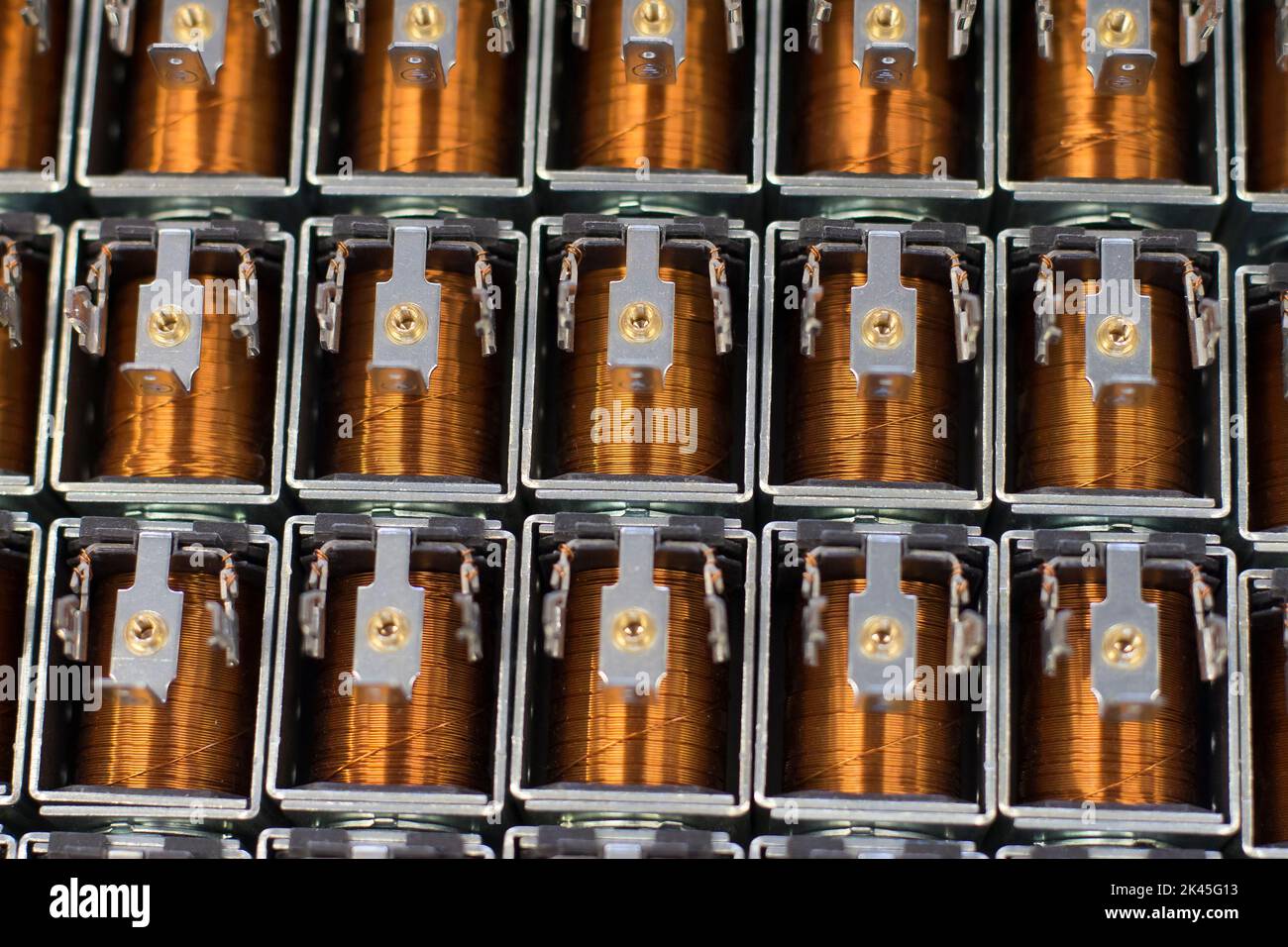 Close up on industrial coils made of copper Stock Photo - Alamy