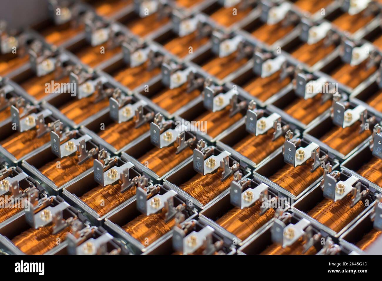 Close up on industrial coils made of copper Stock Photo - Alamy
