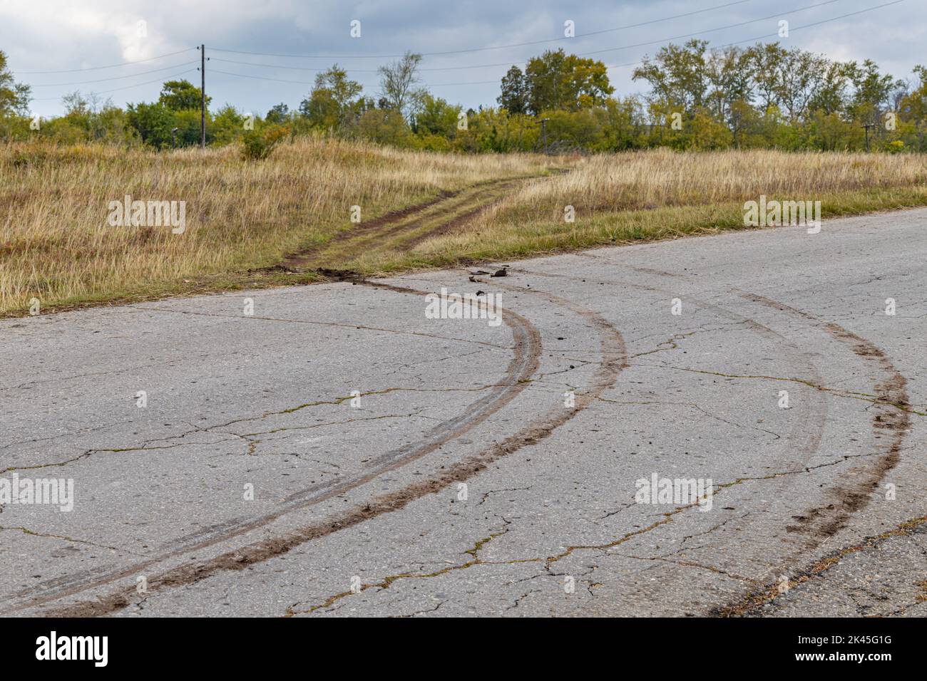 track from the wheel of the car on the asphalt. dirty car trail Stock ...