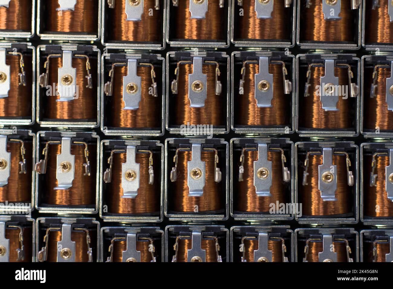 Close up on industrial coils made of copper Stock Photo - Alamy