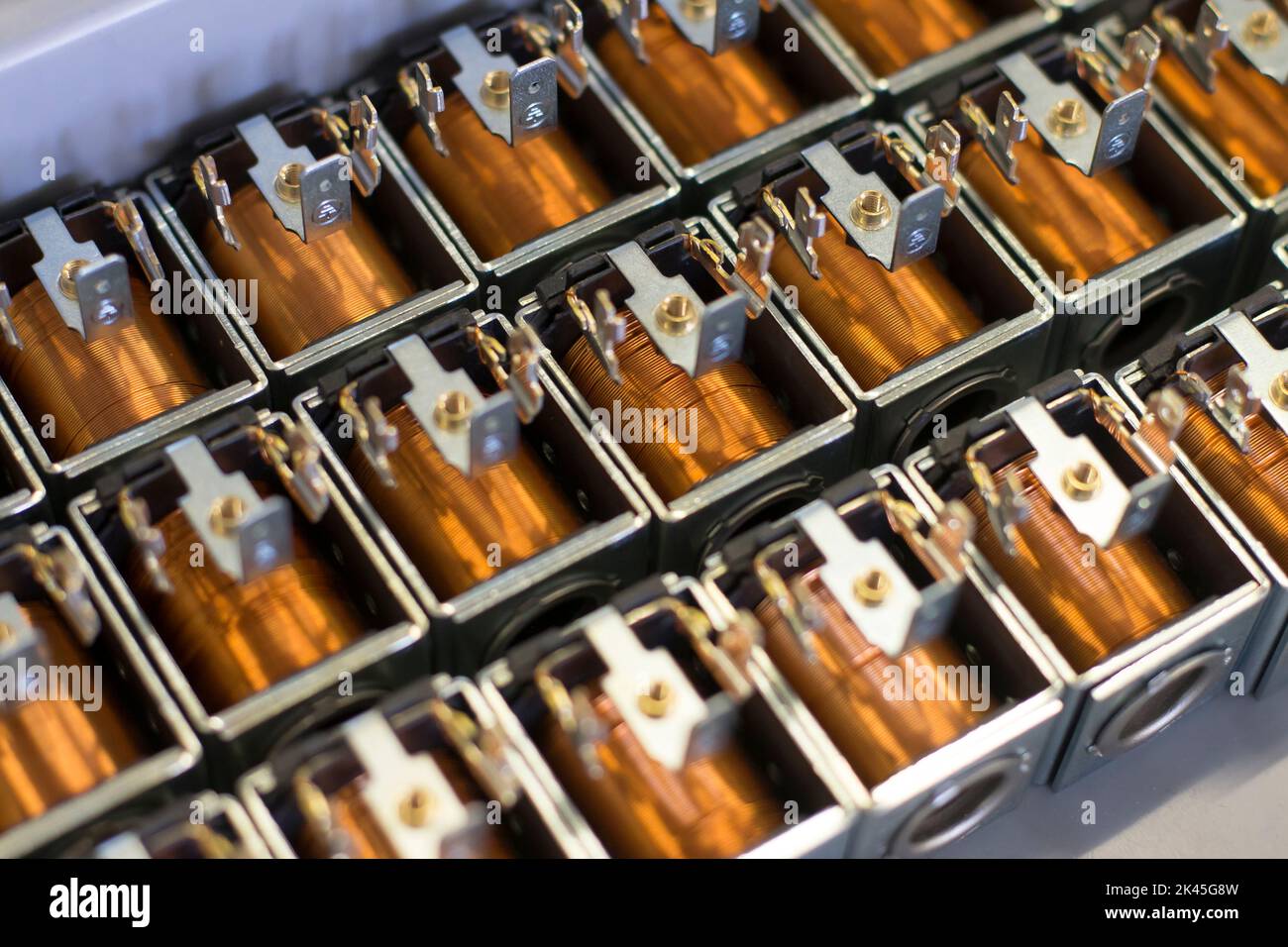 Close up on industrial coils made of copper Stock Photo - Alamy