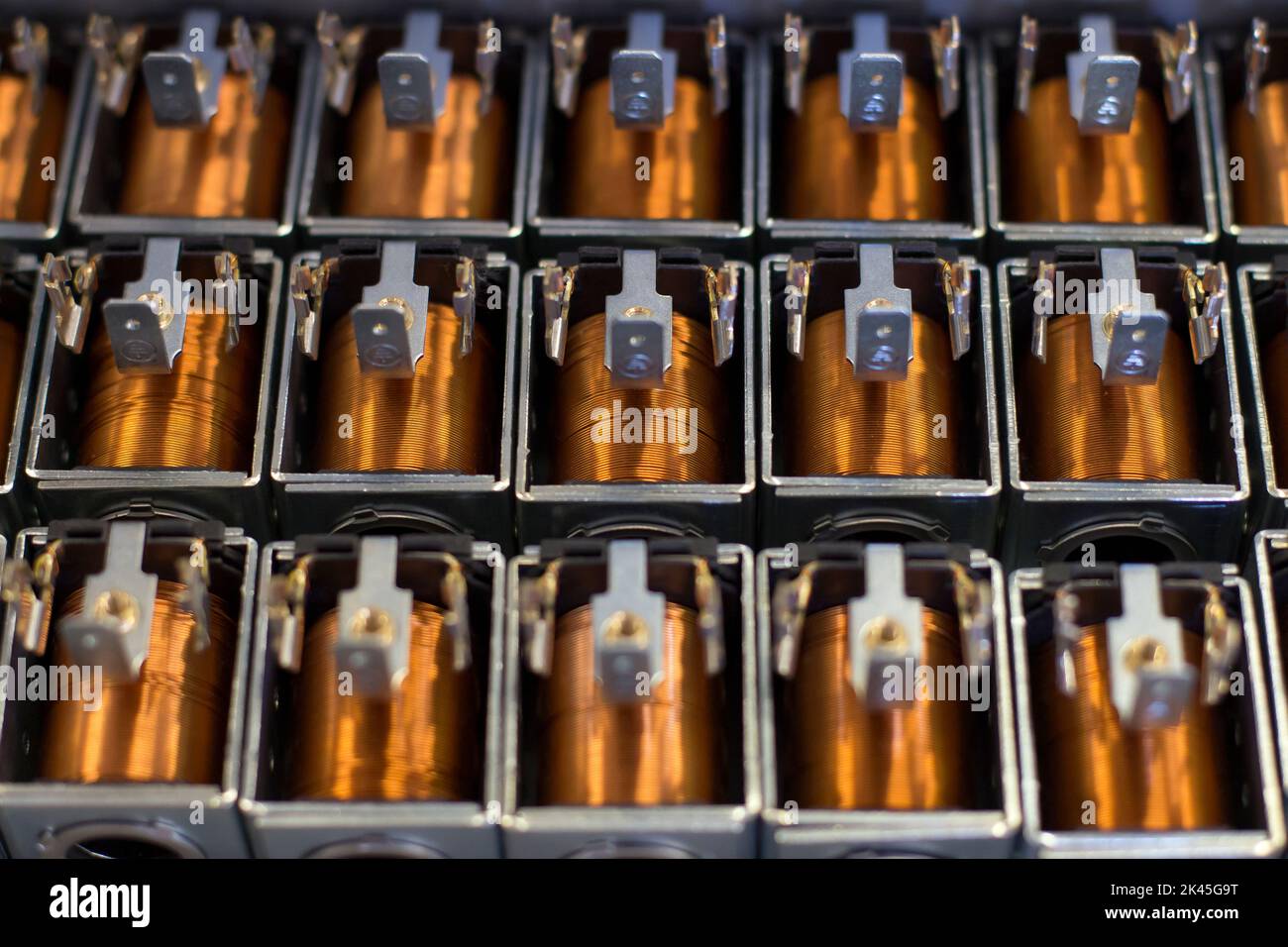 Close up on industrial coils made of copper Stock Photo - Alamy