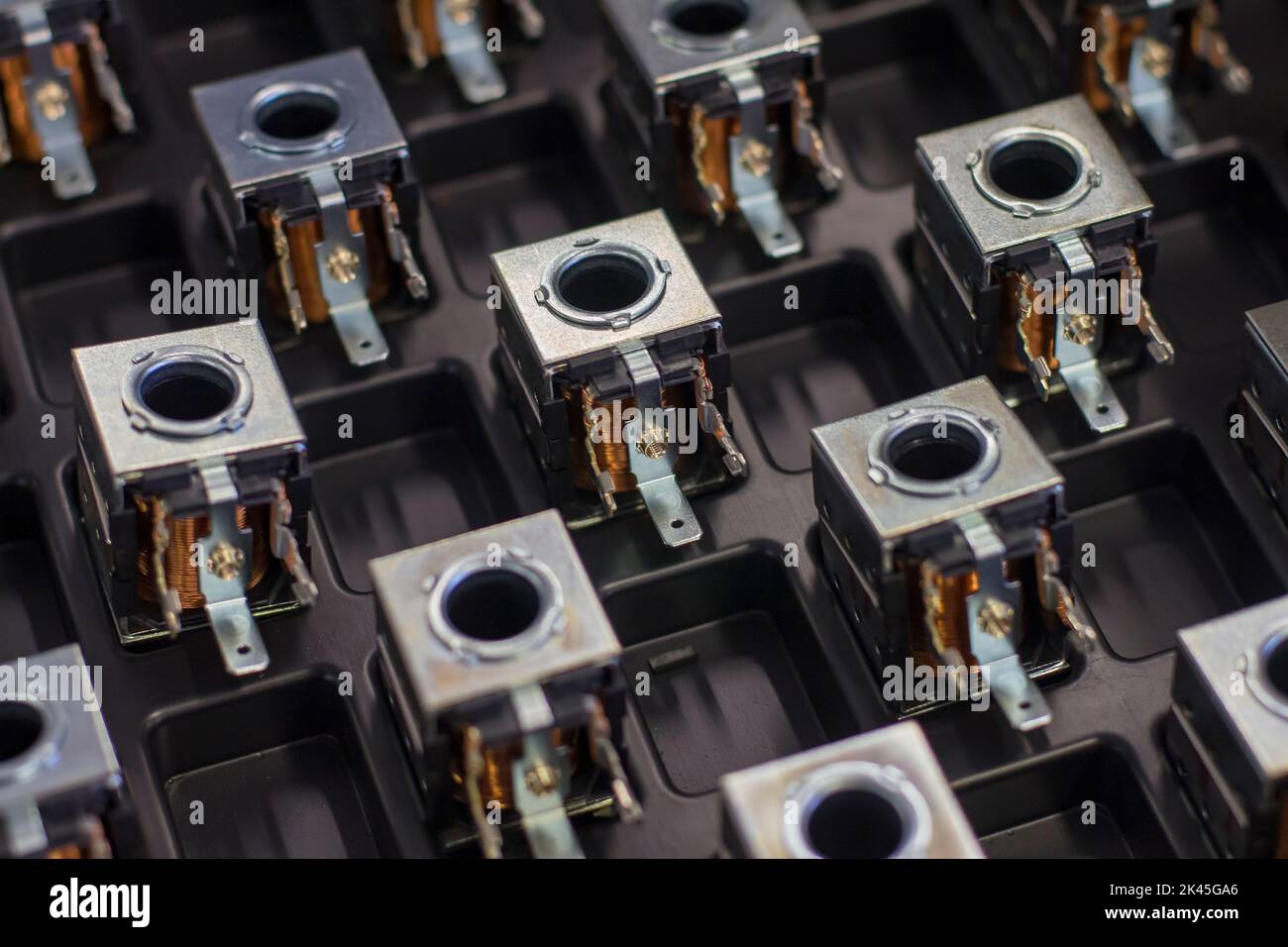 Close up on industrial coils made of copper Stock Photo - Alamy