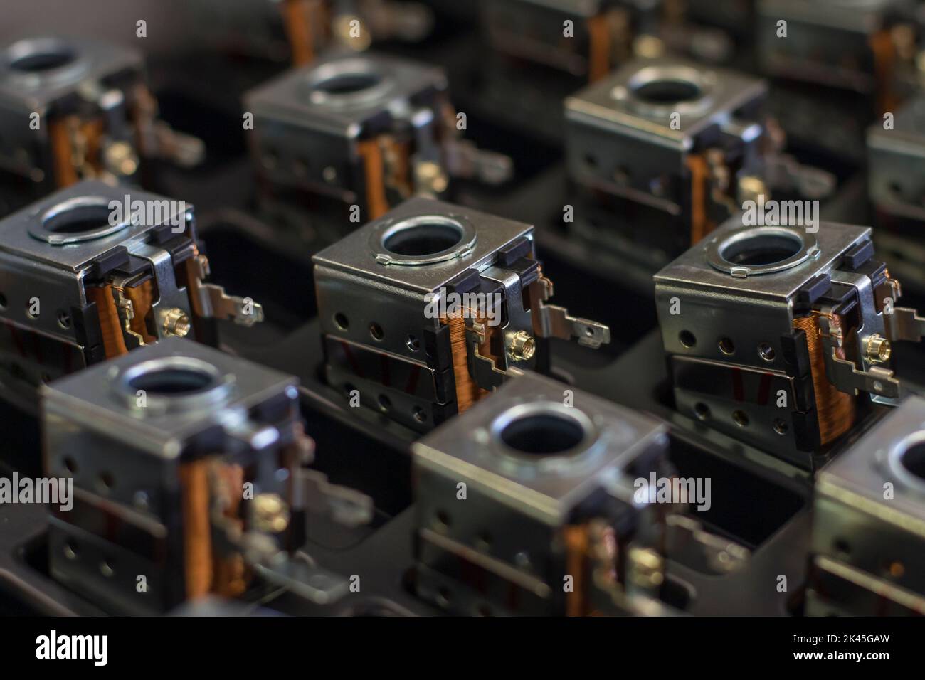 Close up on industrial coils made of copper Stock Photo - Alamy
