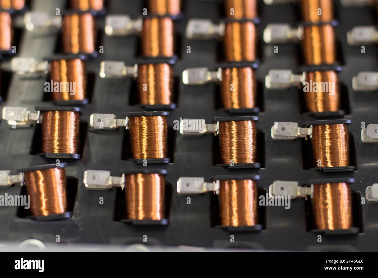 Close up on industrial coils made of copper Stock Photo - Alamy