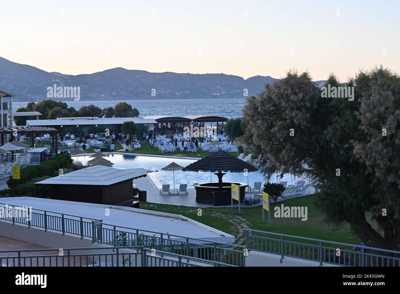 Barbecue dinner in a holiday resort at pool area Stock Photo - Alamy