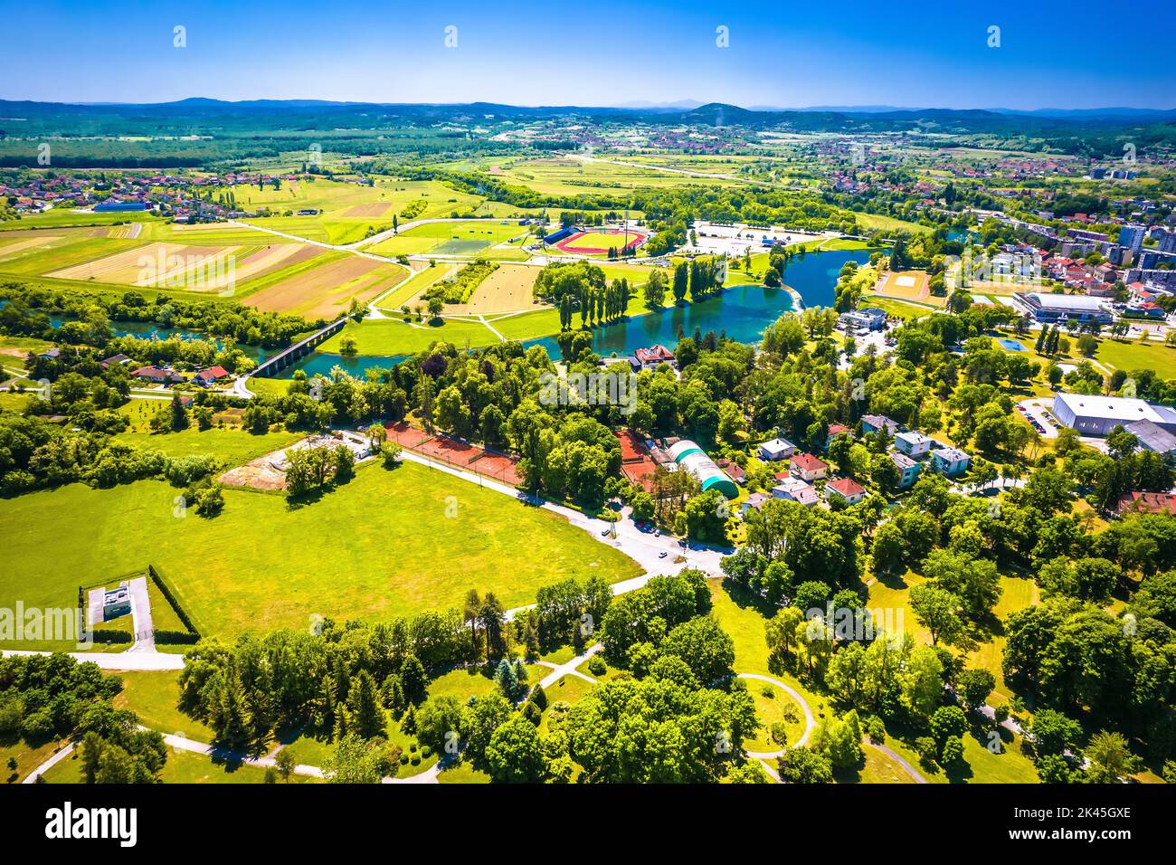 Aerial view of Korana river and green landscape in town of Karlovac ...