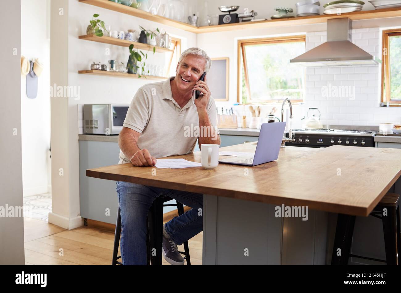 Call, laptop and finance with a senior man using a phone while planning ...