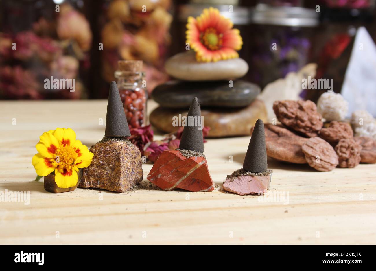 Incense Cones and Desert Rose Rocks on Meditation Table With Pyramid in ...