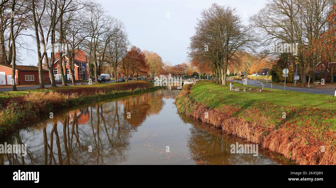 A rural German village in the fall. It is built on both sides of a ...