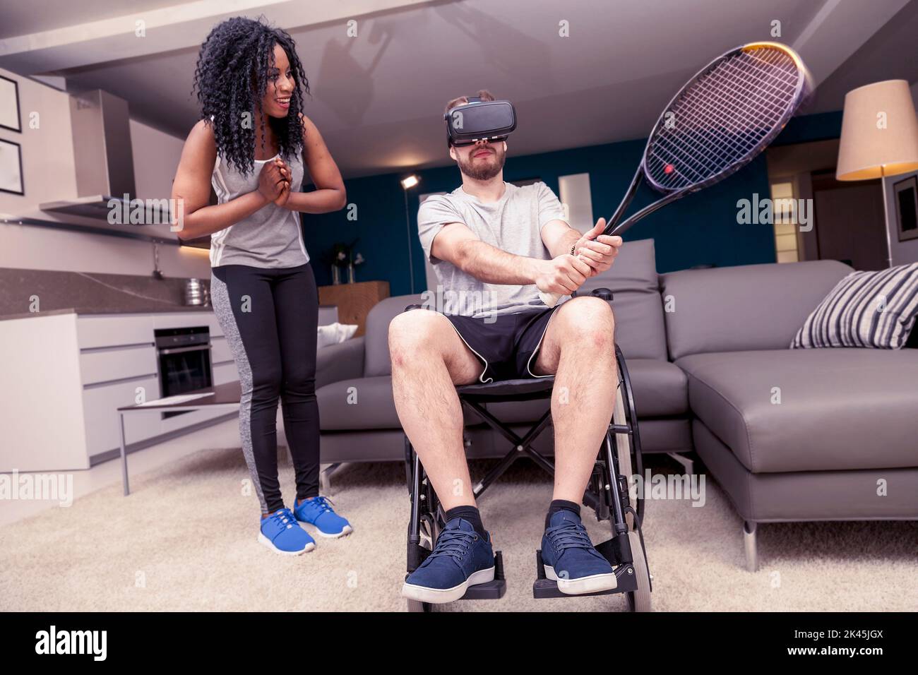 young girl helps a disabled who plays tennis with augmented reality ...
