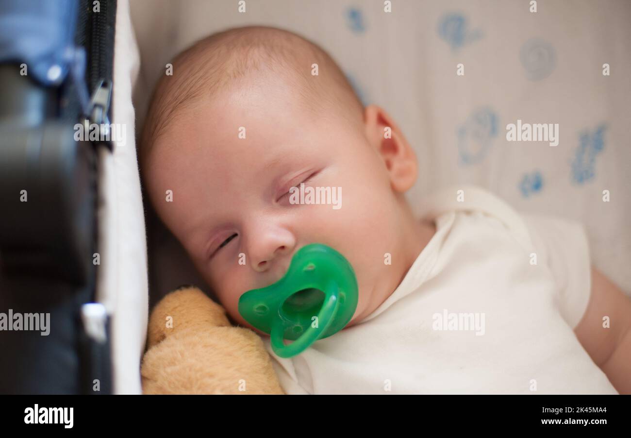 Close-up detail view of cute little peaceful baby calm sleeps soundly ...