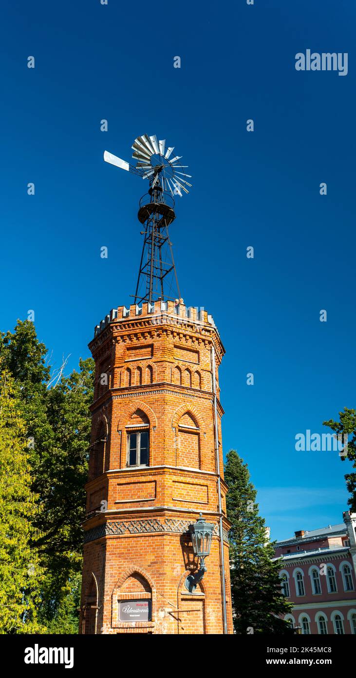 Old Red Brick Water Tower Windmill Weather Vane. View at Dawn of an Old ...