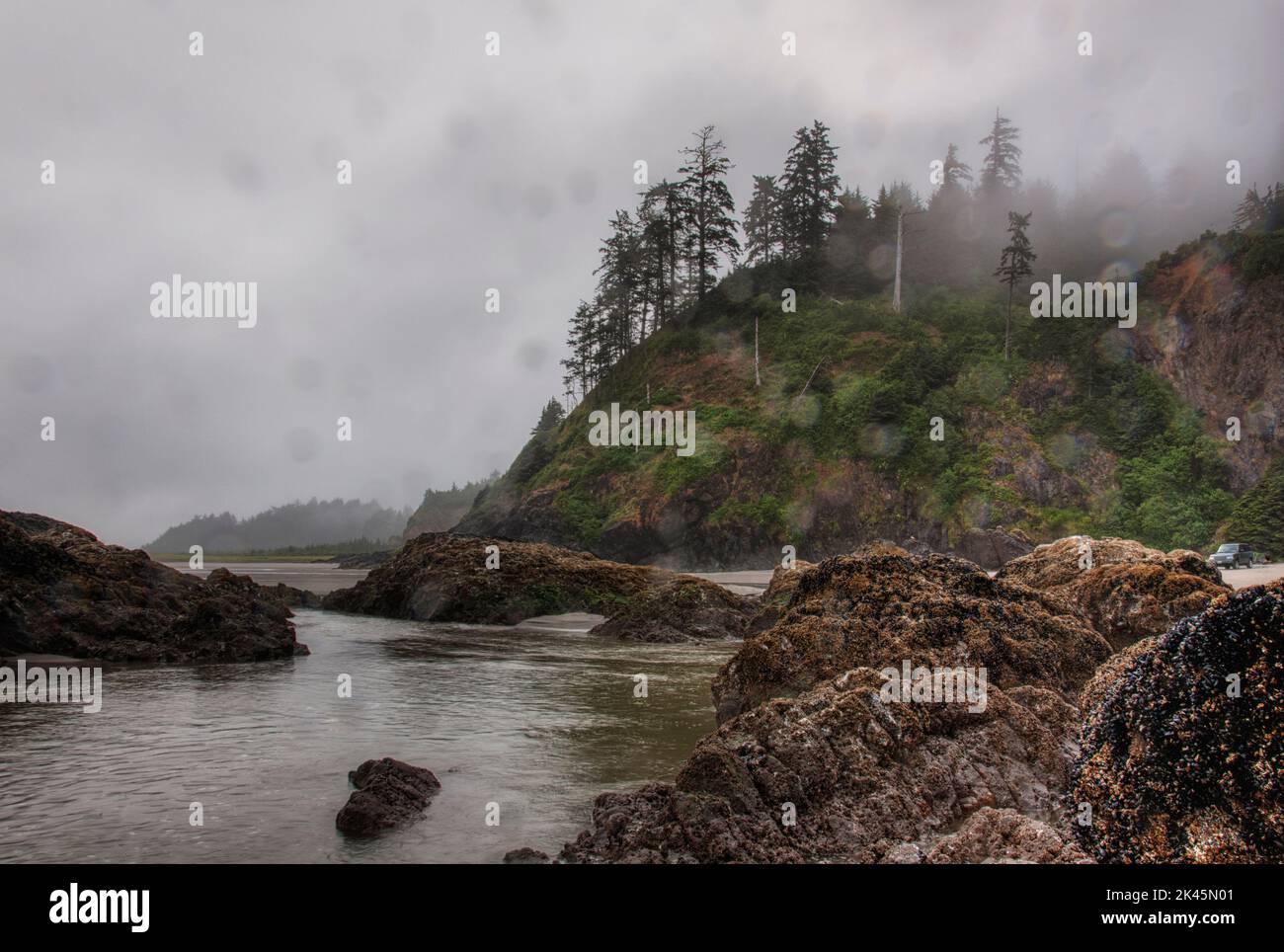 Tide pools in cloudy rural landscape Stock Photo - Alamy