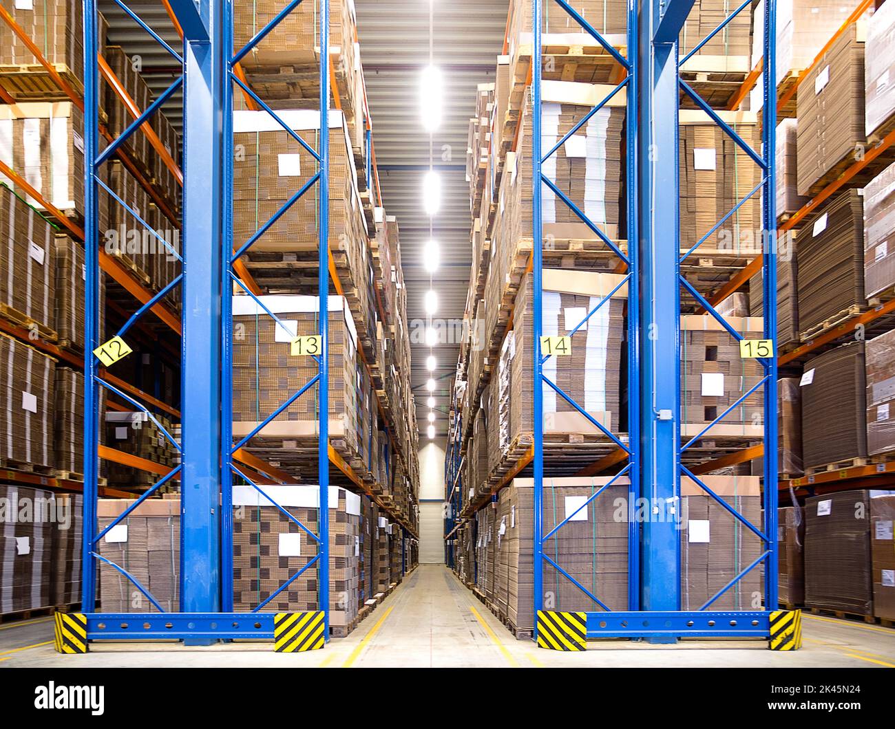 Warehouse storage, racks of cardboard boxes Stock Photo - Alamy