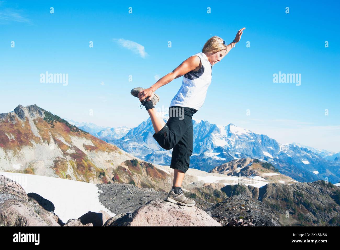 Woman doing balancing yoga pose on Mount Baker, Snoqualmie National ...