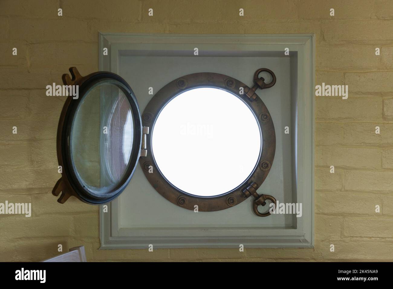 A round window, metal frame and a round glass porthole, open Stock Photo - Alamy