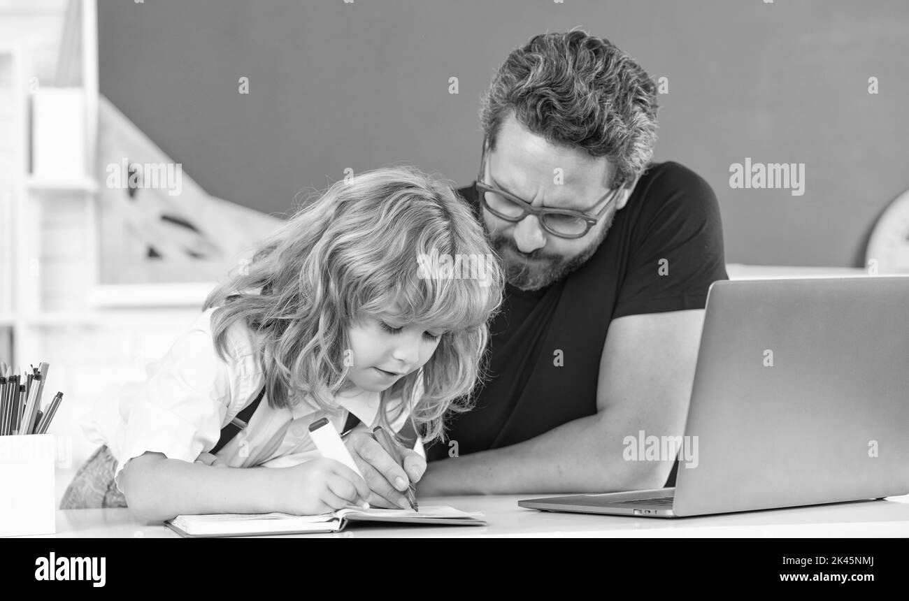 teacher and child study in classroom with laptop, family Stock Photo ...