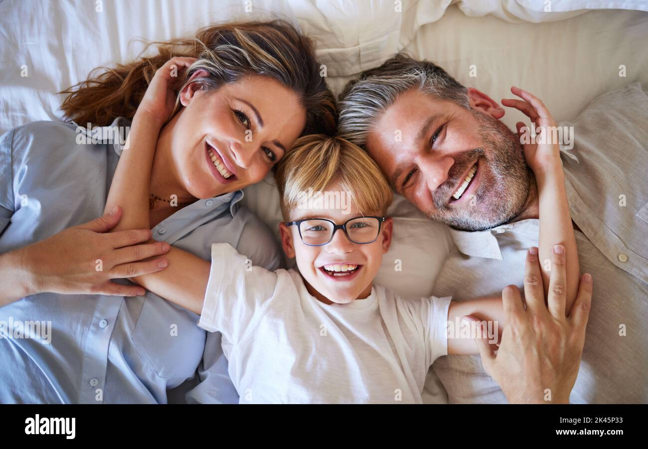 Boy smile at parents hi-res stock photography and images - Alamy