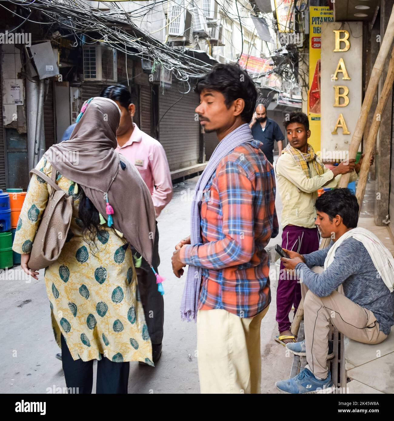 Old Delhi, India, April 15, 2022 - Unidentified group of men walking ...