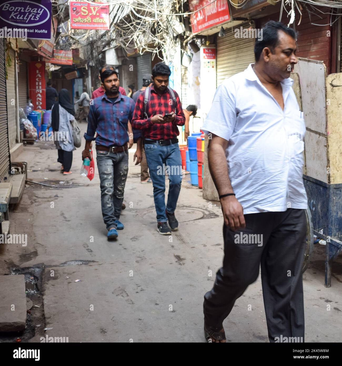 Old Delhi, India, April 15, 2022 - Unidentified group of men walking ...