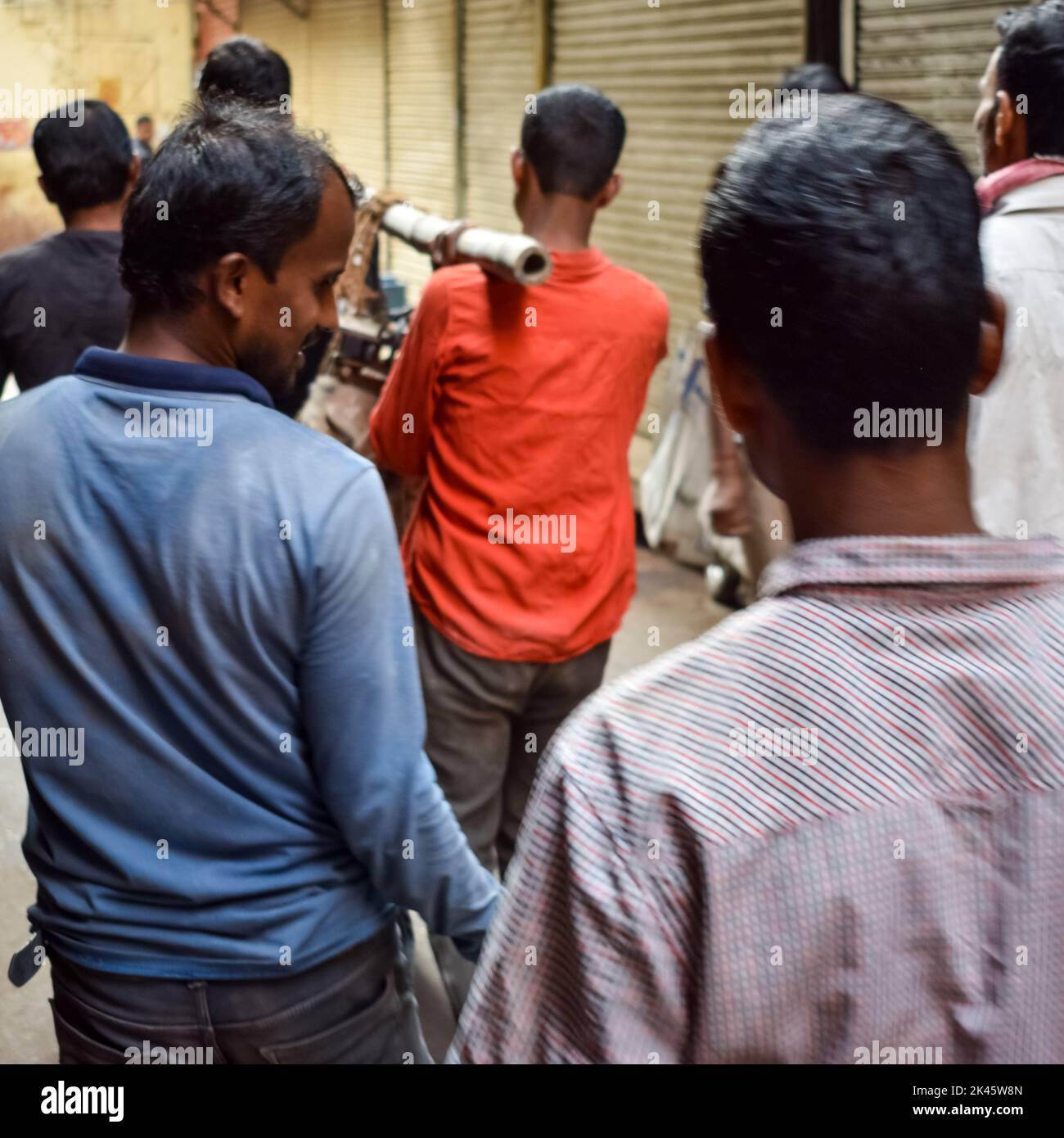 Old Delhi, India, April 15, 2022 - Unidentified group of men walking ...