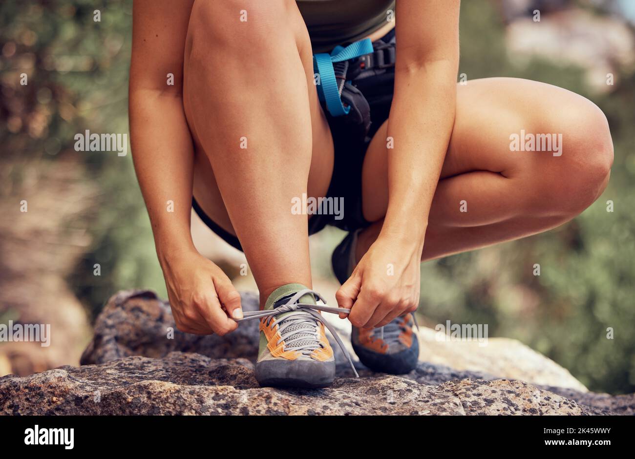Outdoor runner, tie fitness shoes and sports woman start cardio workout in los angeles forest ...