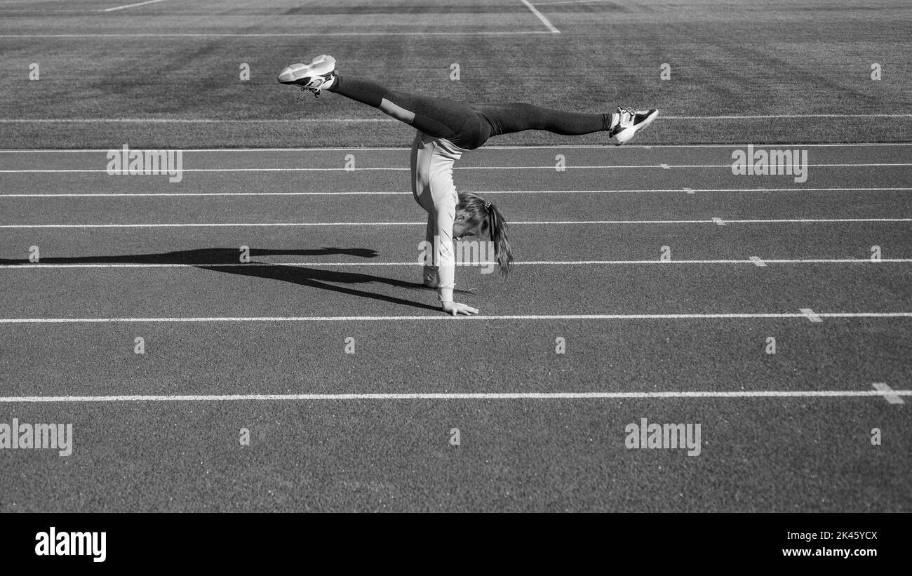 There is always a new trick to learn. Girl do handstand with legs in ...