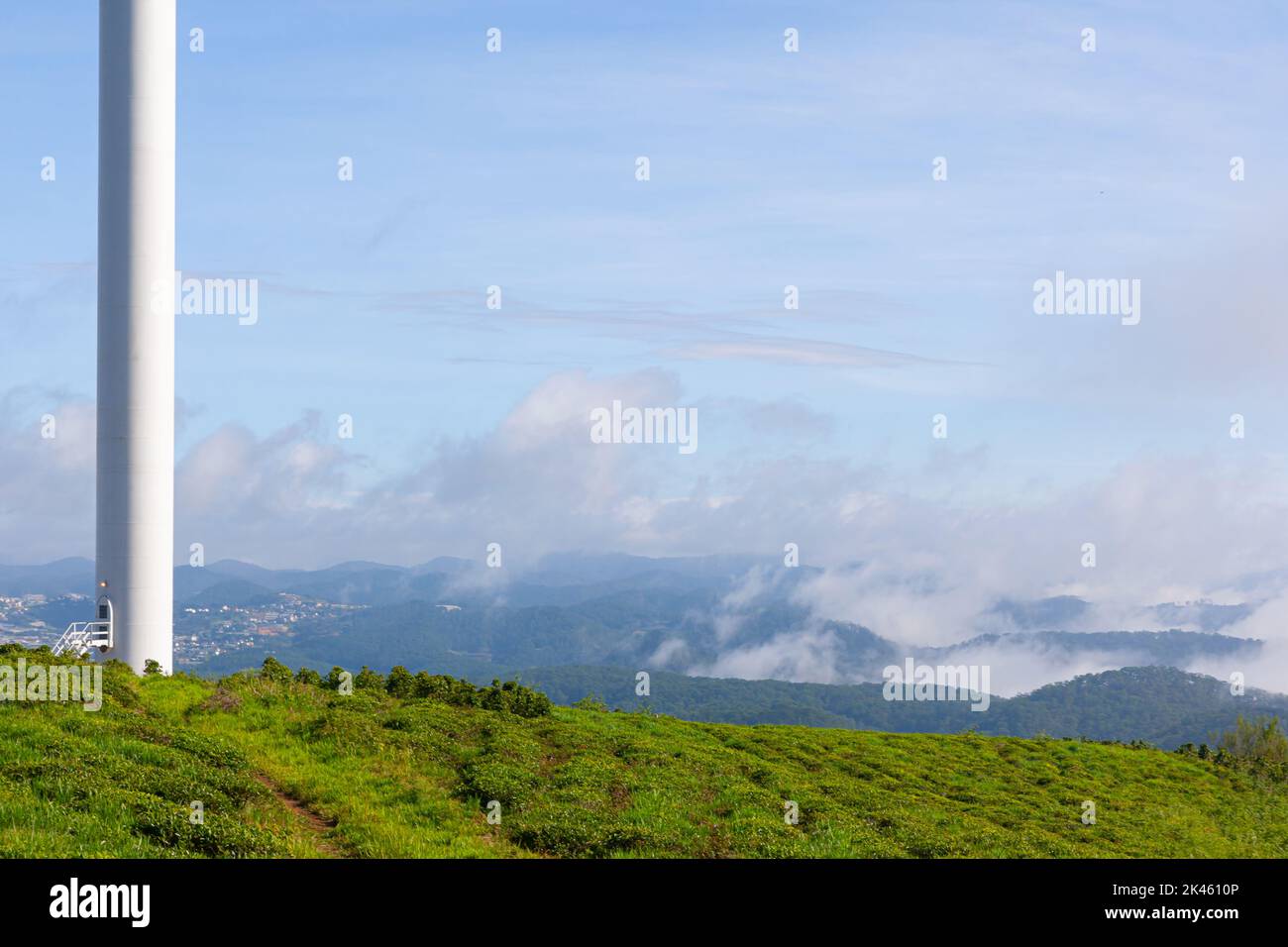 Renewable energy wind turbines windmill isolated on the beautiful blue ...