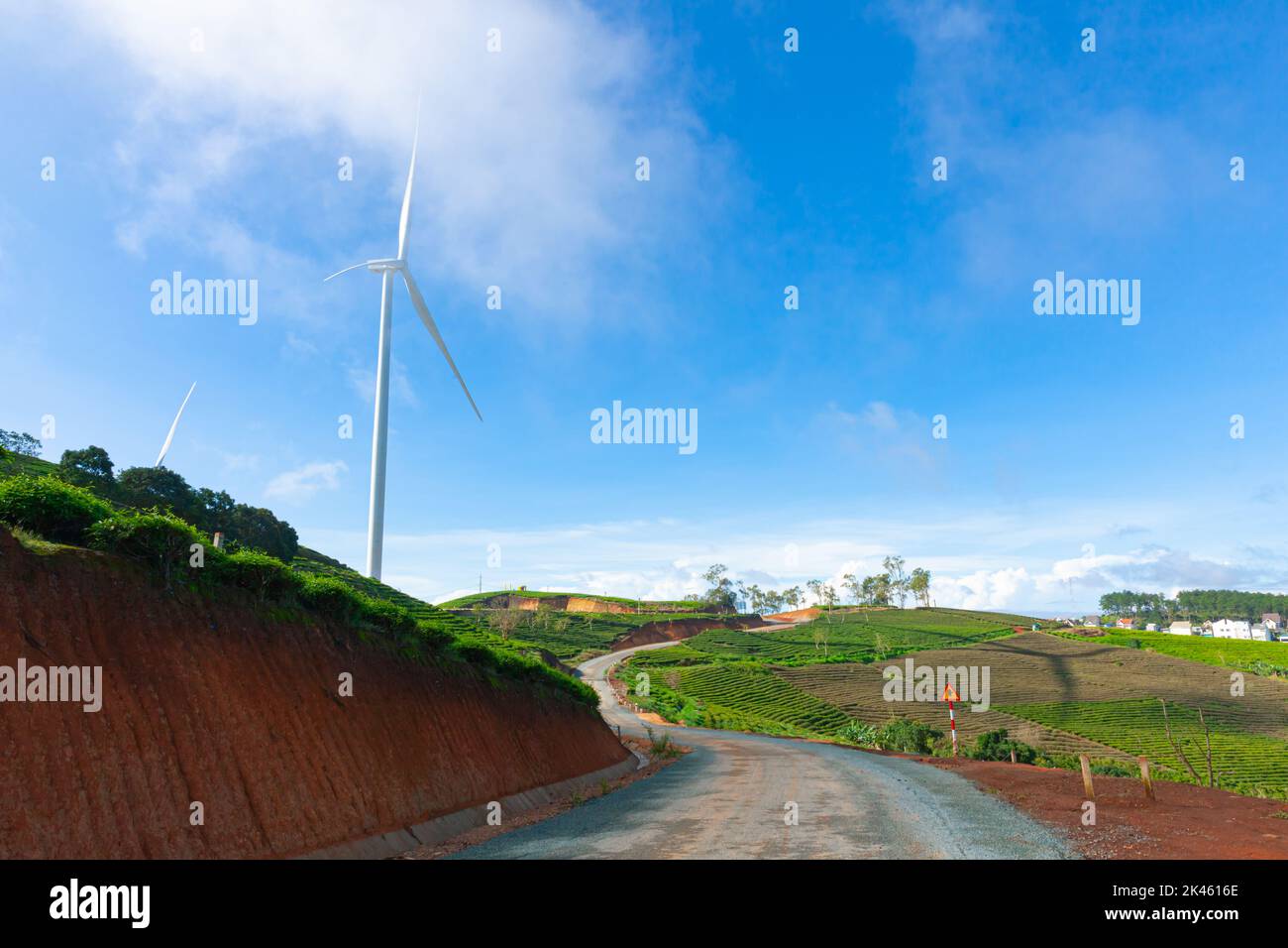 Renewable energy wind turbines windmill isolated on the beautiful blue ...