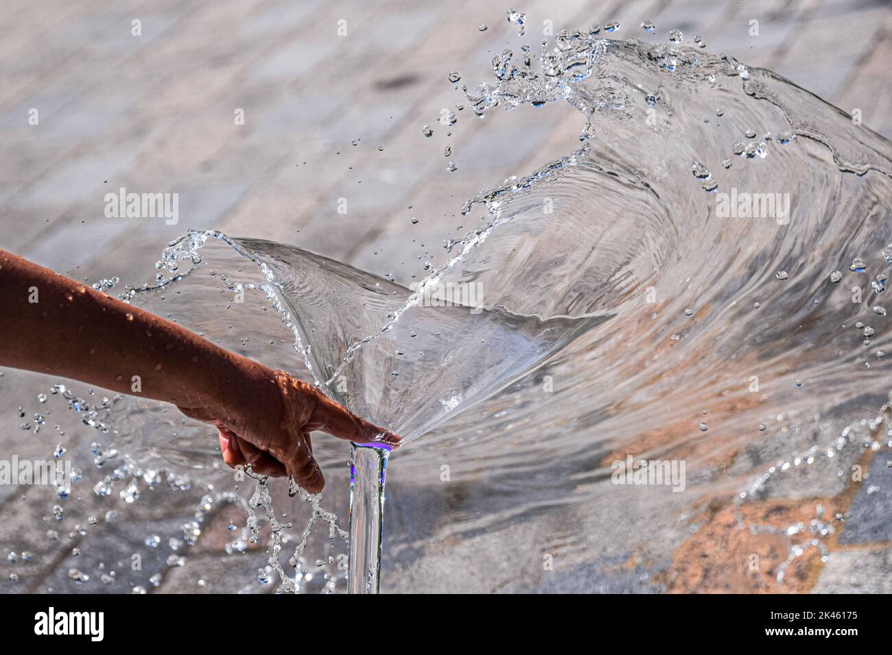 Splash of water in woman hand hi-res stock photography and images - Alamy