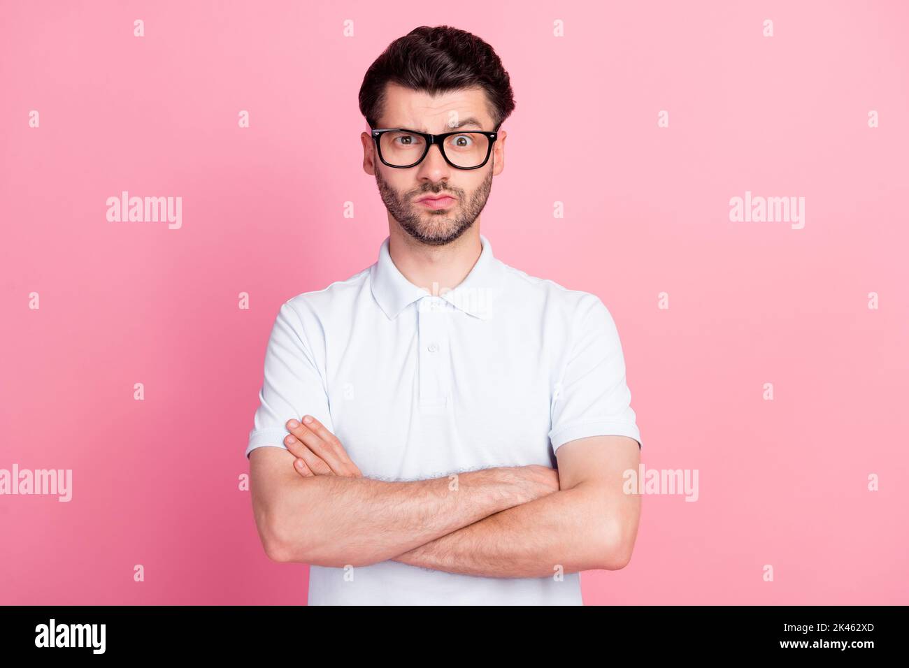 Photo of young handsome serious distrust funny guy pouted lips folded ...