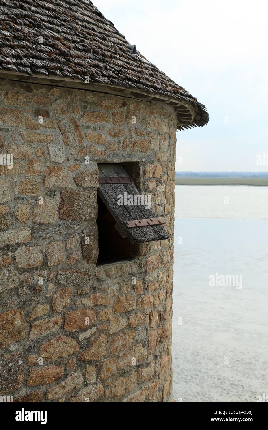Window with wooden shutter on turret on building in Grande Rue on Le ...