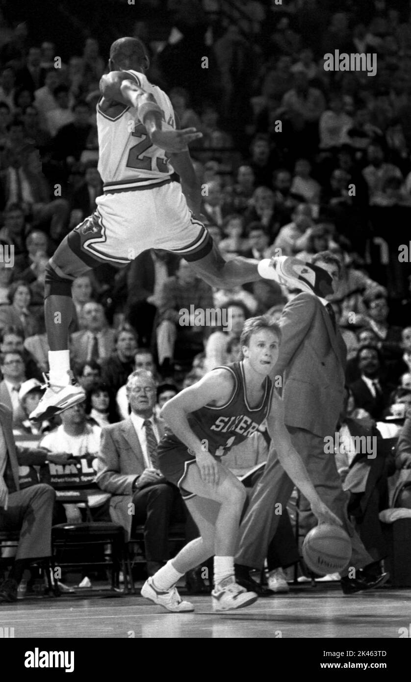 NBA superstar Michael Jordan of the Chicago Bulls flies through the air ...