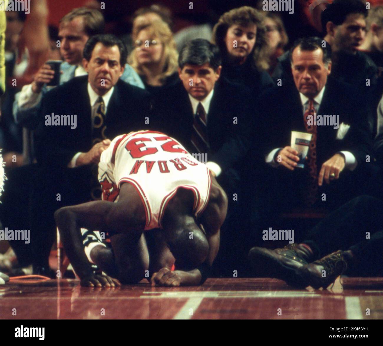 Michael Jordan of the Chicago Bulls gets up from the floor after ...