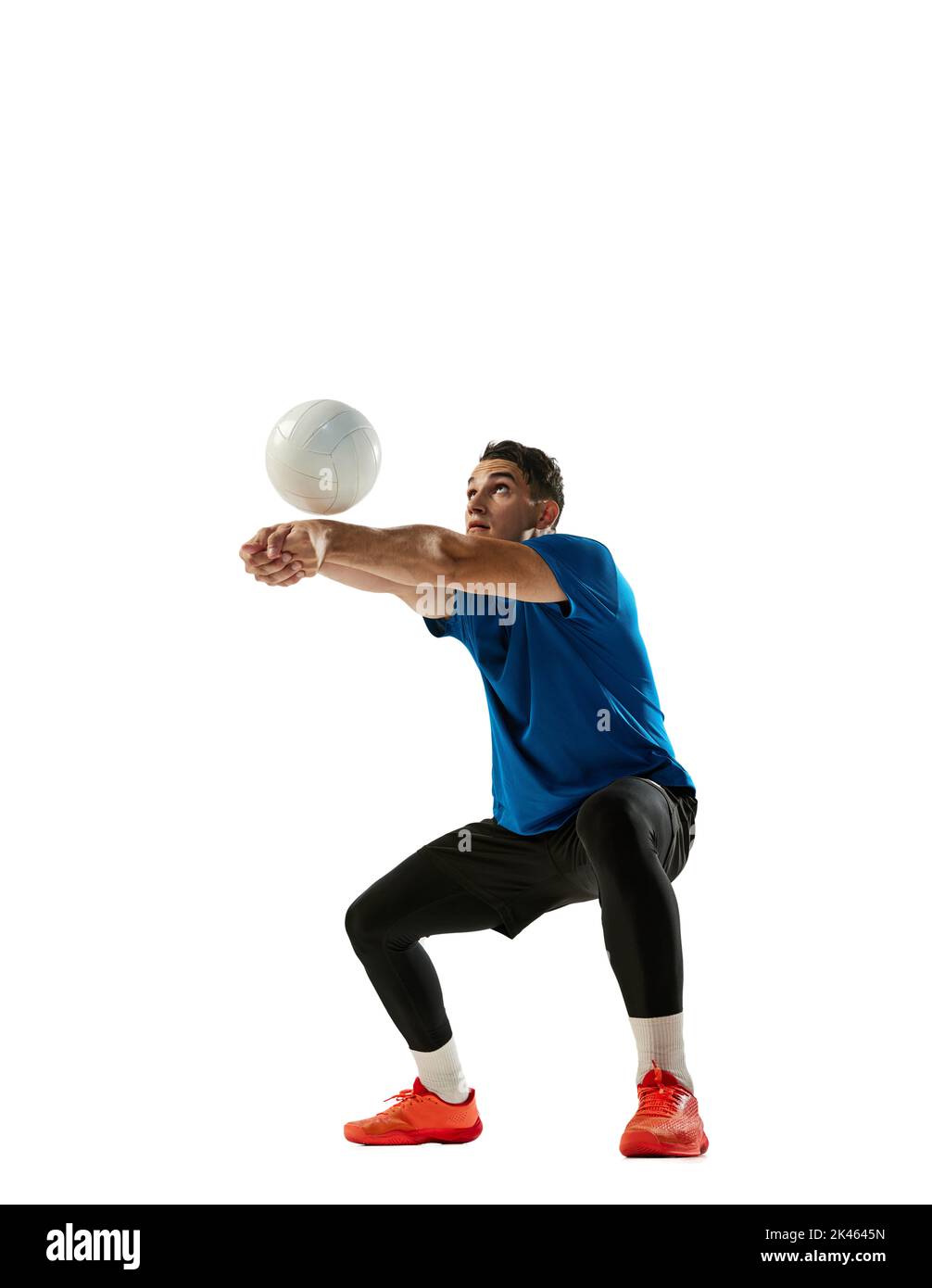 Receiving the ball. One volleyball player training with ball isolated ...