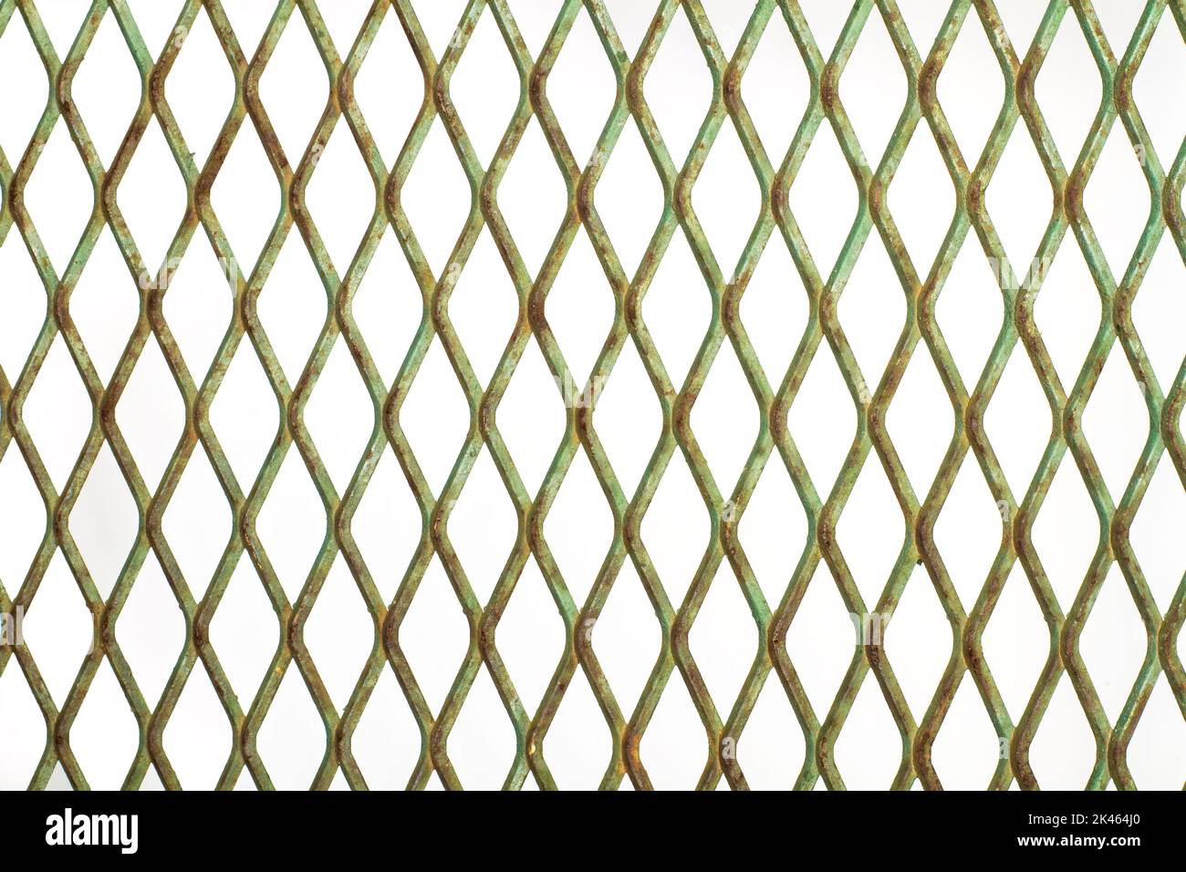 A rhombus shape green metal fence in a close up view Stock Photo - Alamy