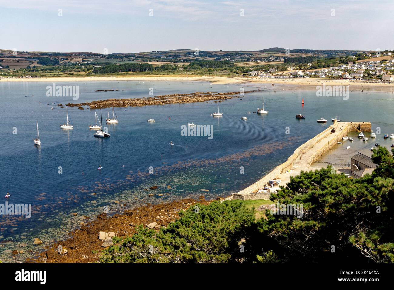 Looking back across the harbour and causeway towards Marazion from St ...
