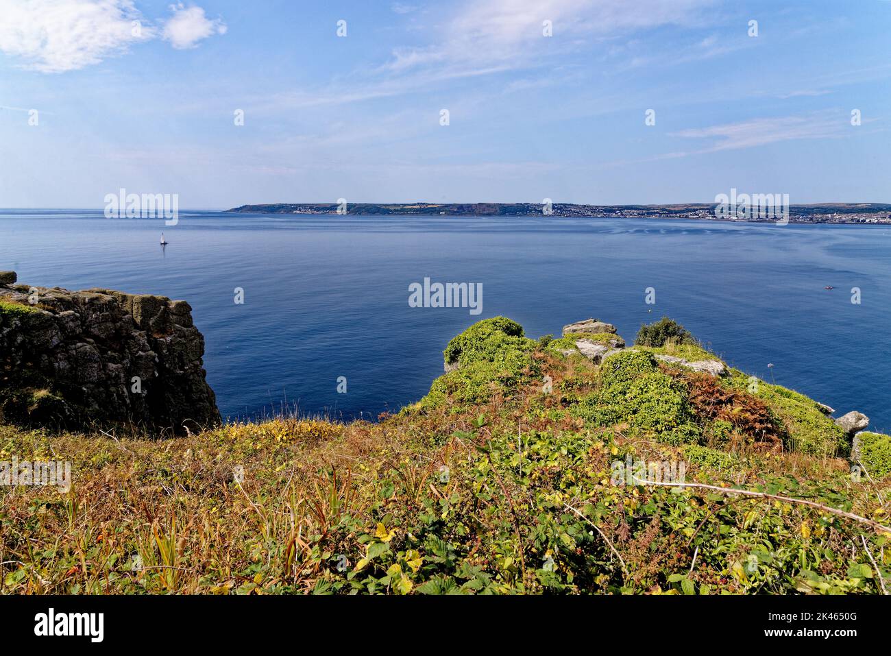Looking back across the harbour and causeway towards Marazion from St ...