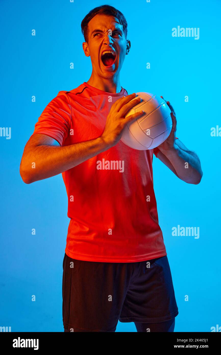Winner Emotions Young Male Volleyball Player With Ball Shouting