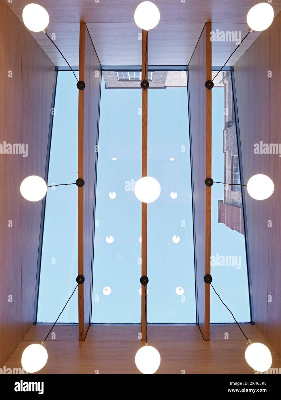 Illuminated pendant lamp from below with roof light. Pall Mall Deposit ...