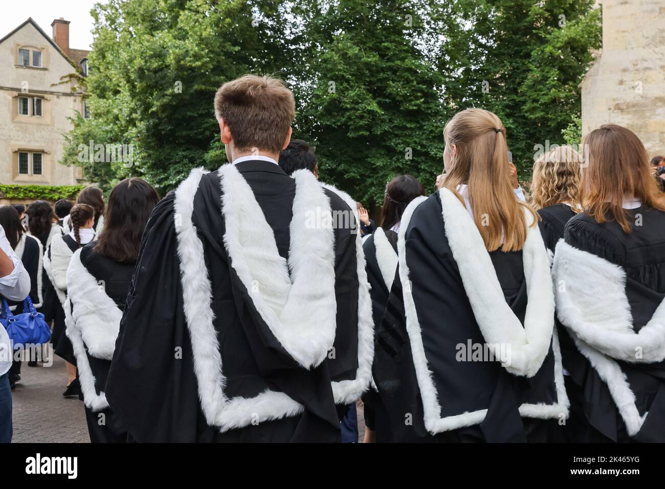 Male female walk to graduation hi-res stock photography and images - Alamy