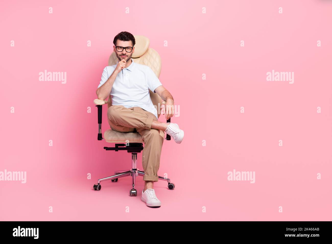 Full length photo of good looking responsible man sitting chair ...
