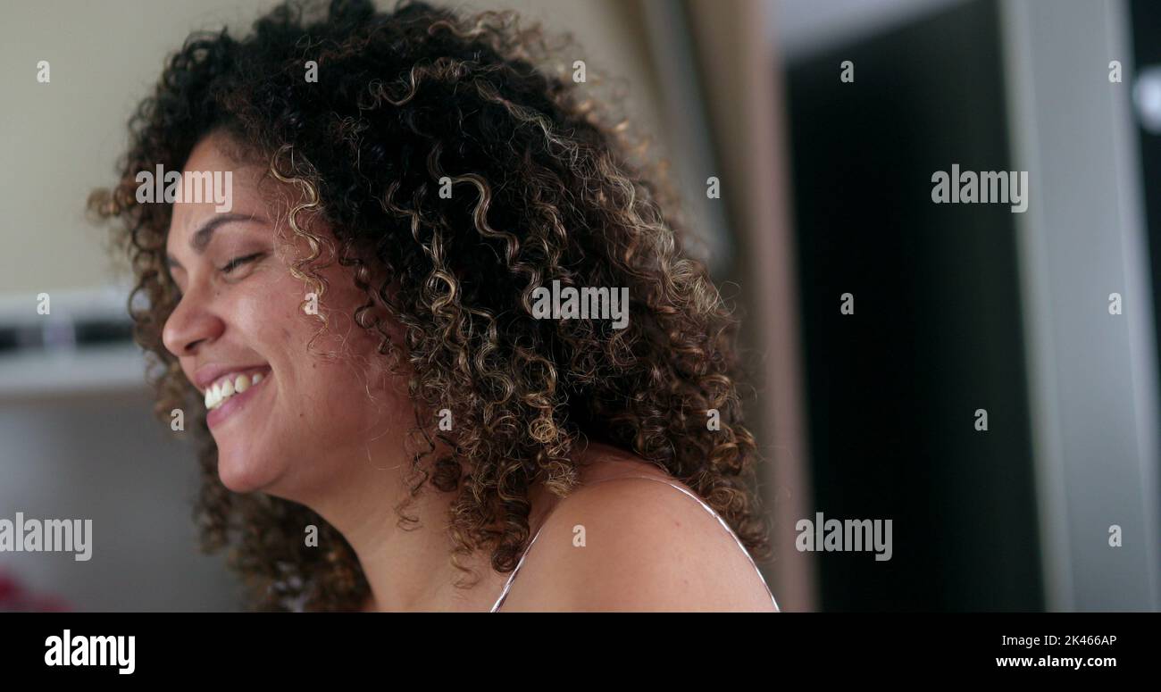 Happy Brazilian woman laughing and smiling. Joyful person real life ...