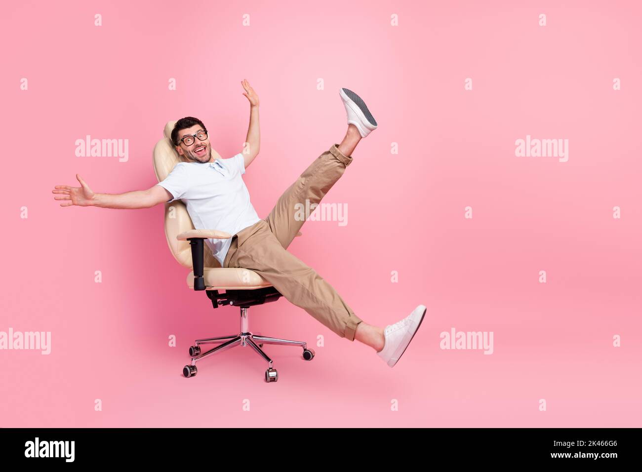 Full length photo of playful manager guy relax after work ride fast ...