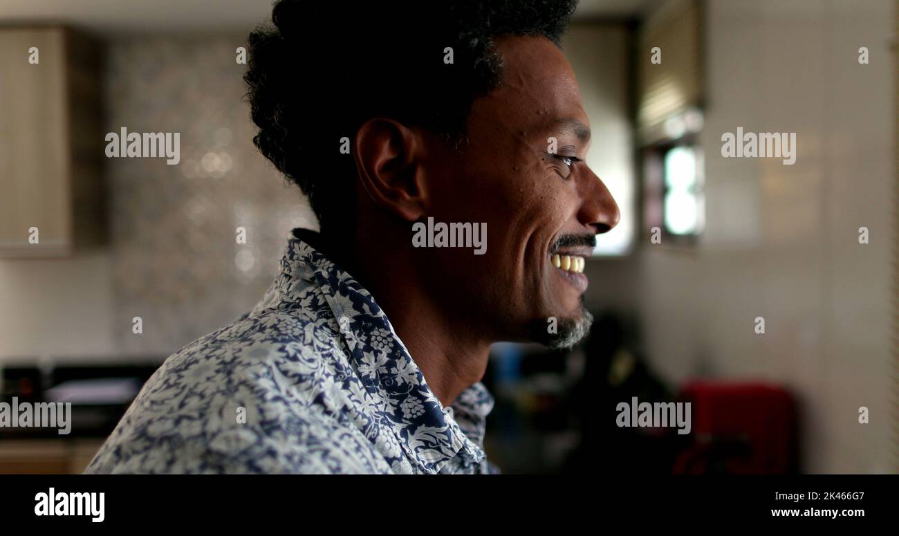 Happy African man smiling, candid and natural profile Stock Photo - Alamy