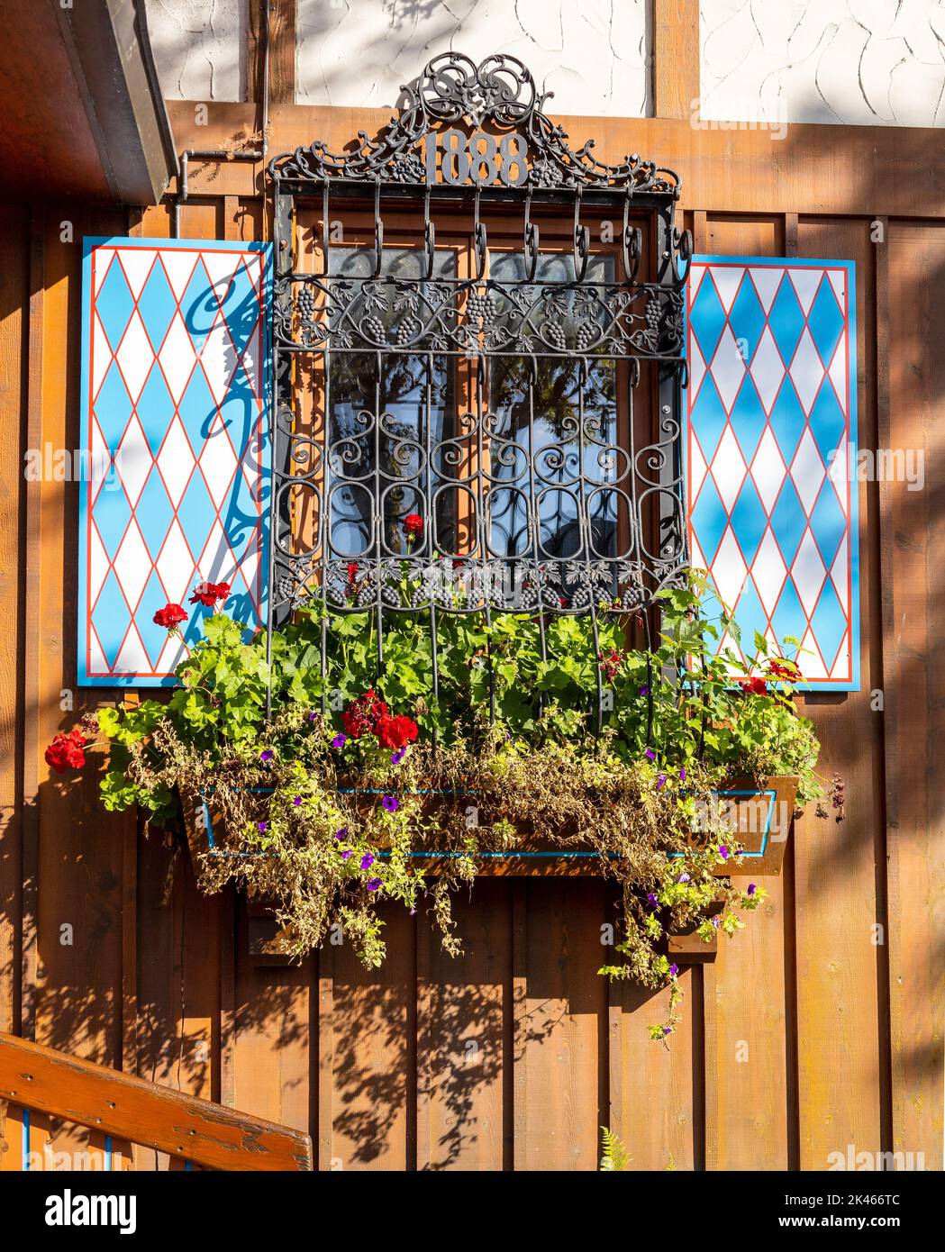 Traditional Bavarian Style Window With Shutters And Window Box With ...
