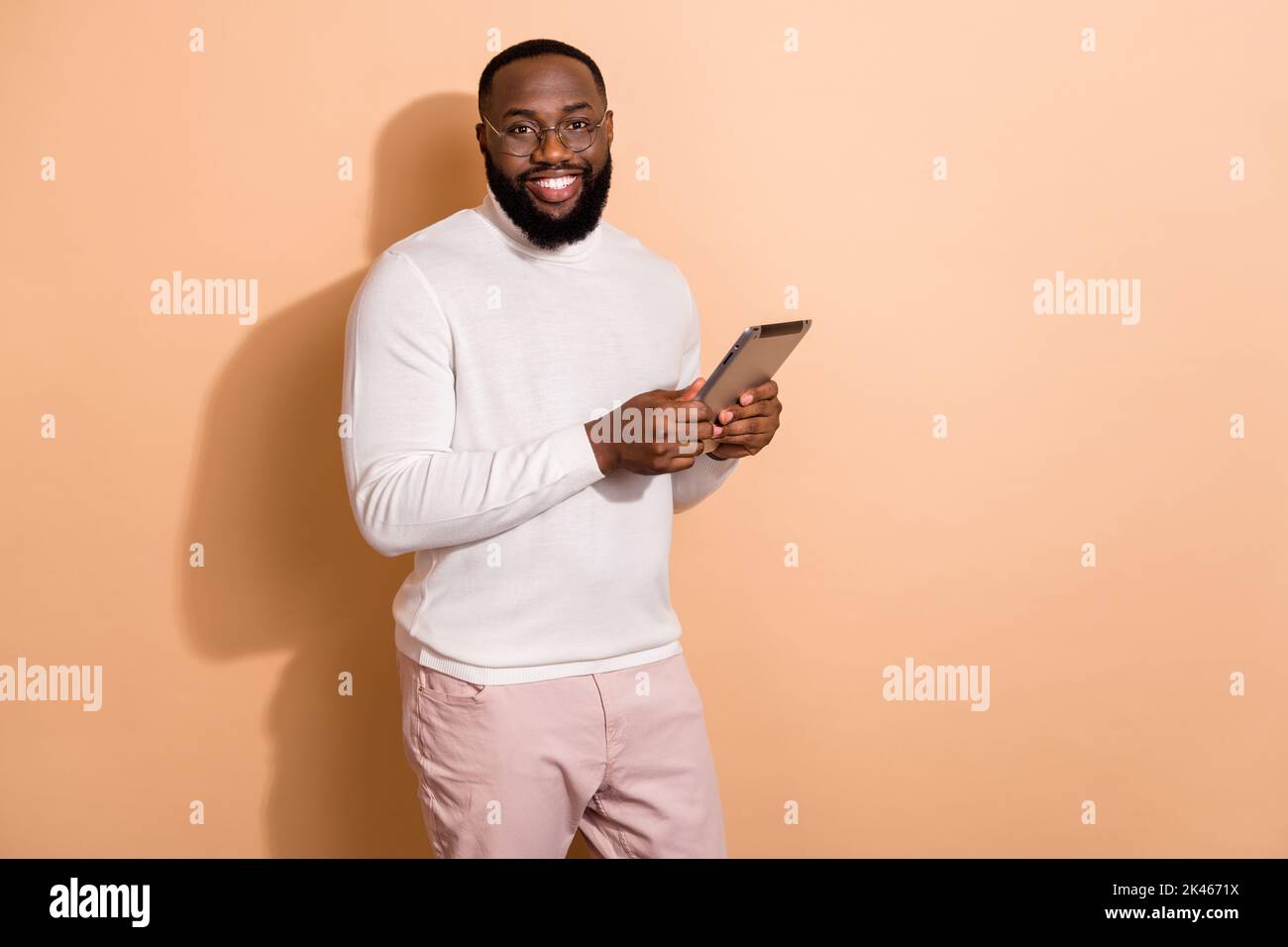 Photo of positive smart guy expert use tablet device search network ...