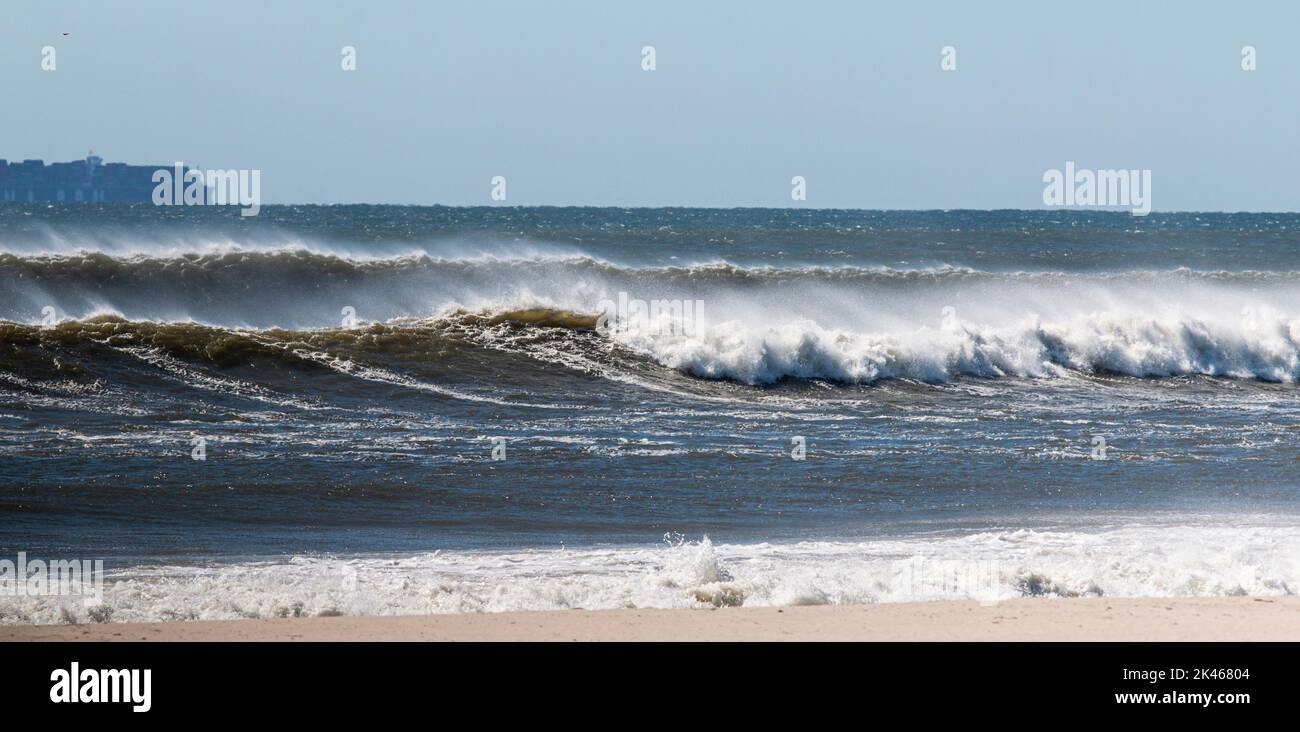 Rough Atlantic Ocean waves from a hurricane far off the coast with ...