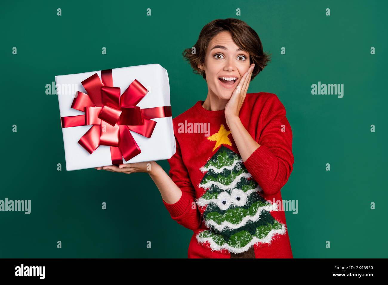 Photo of impressed funky lady wear red sweater hand cheek rising bow ...